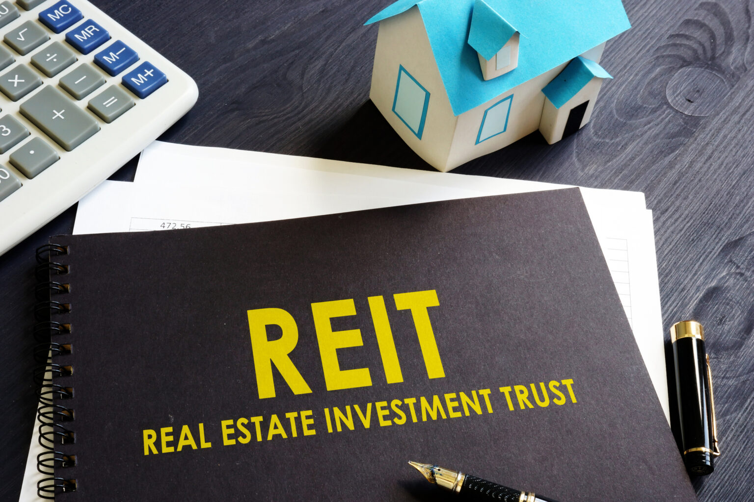 Real Estate Investment Trust (REIT) | Definition + Examples